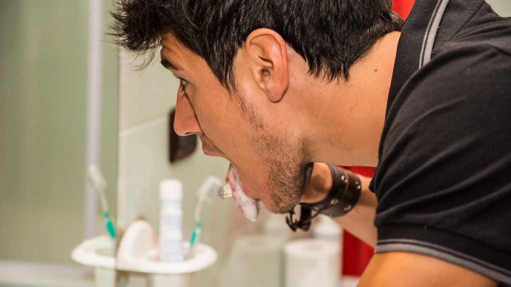 Tongue scraping: Possible benefits and how to do it