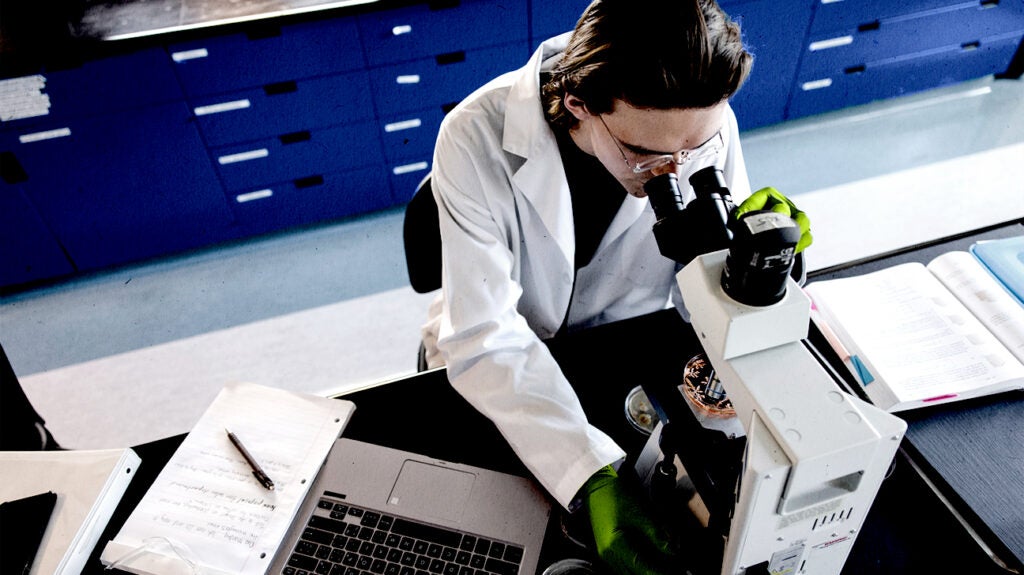 What is a pathologist and how does a person become one?