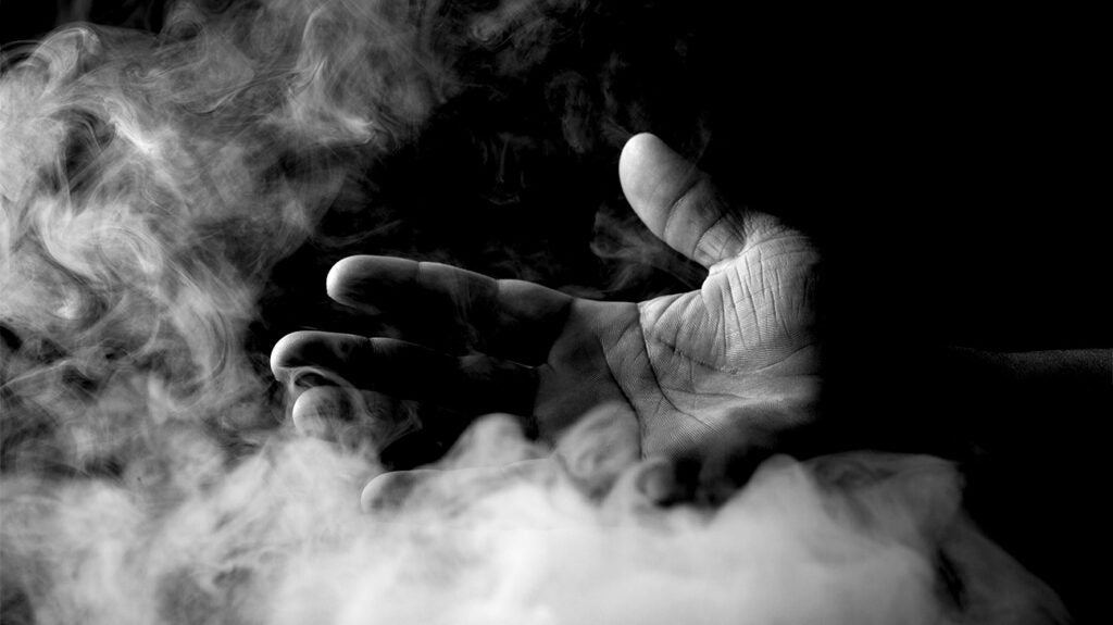 How does smoking affect multiple sclerosis?